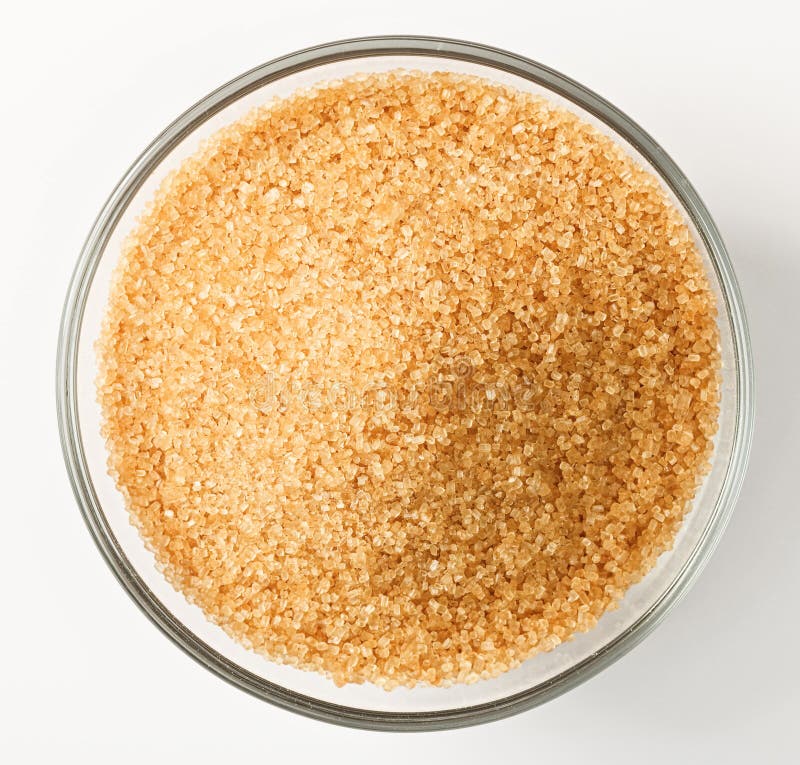 Cane sugar in a glass bowl stock photo. Image of heap - 13624438