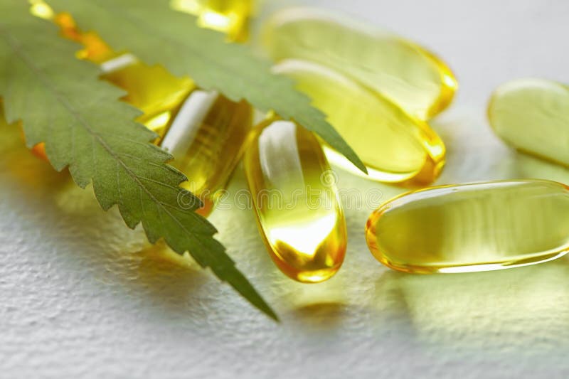 Cannabis Essential Oil Capsules on White Background. CBD Oil Capsules ...