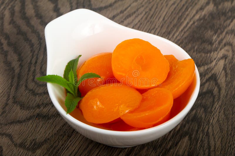 Canned apricots stock photo. Image of organic, preserve - 112191370