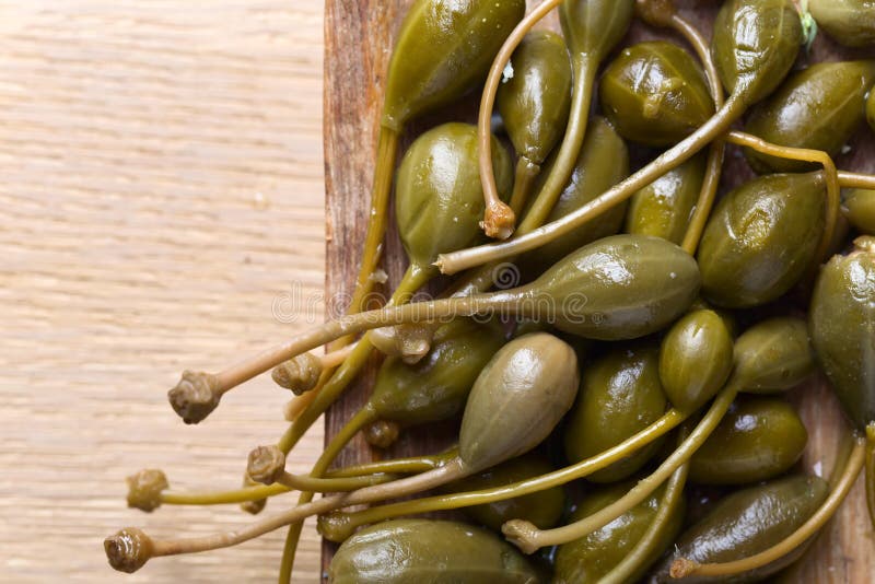 Canned capers with thyme stock photo. Image of closeup - 246469844
