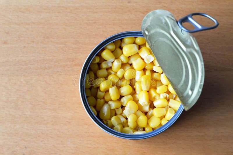 Sweet corn in a tin stock image. Image of delicious - 144106925