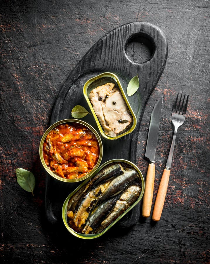 Canned Fish in Cans on a Cutting Board Stock Image - Image of meal ...