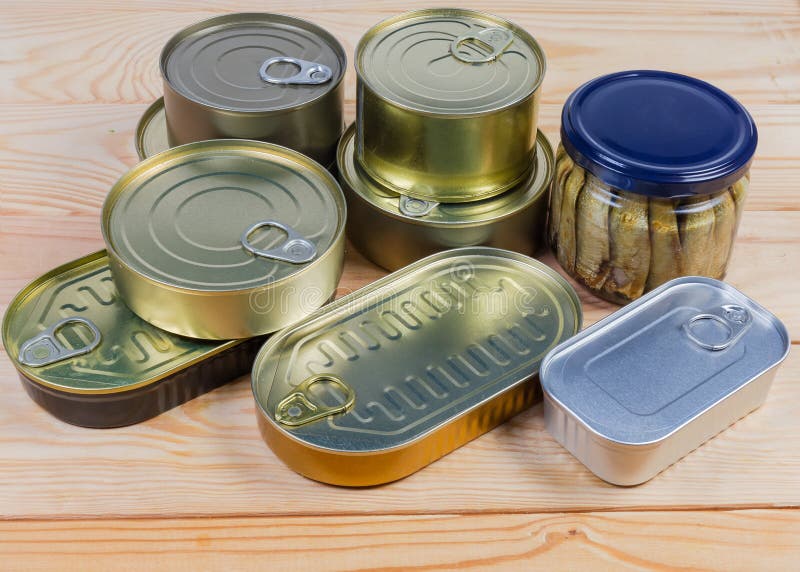 Canned Fish in Different Sealed Tin Cans and Glass Jar Stock Photo ...
