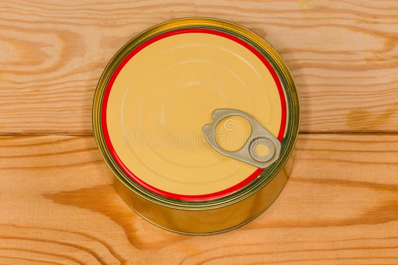 Canned Meat in Sealed Tin Can on Rustic Table Stock Photo - Image of ...