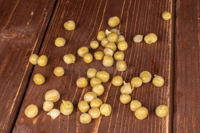 Canned pea on brown wood stock image. Image of pile - 174064501