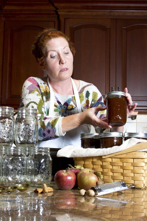 Two women canning stock image. Image of kitchen, preserving - 11482365