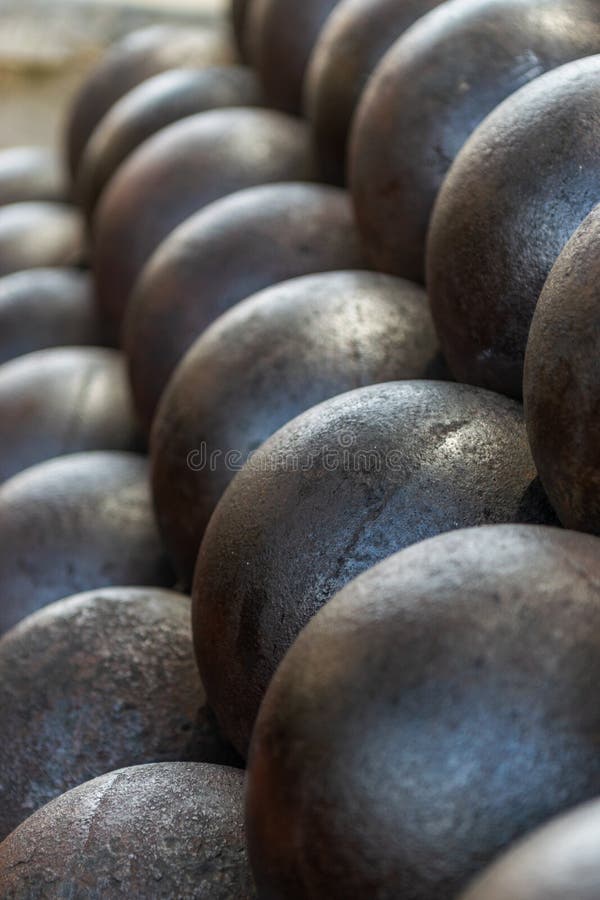 Cannon balls in row stock photo. Image of military, artillery - 215982598