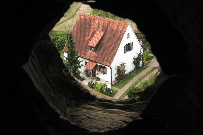 House Viewed through Hole in Wall Stock Image - Image of hole, home: 74409