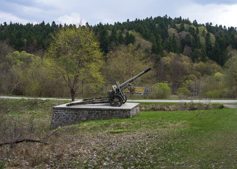 Cannon from the Second World War in Forest on Concrete Base Editorial ...