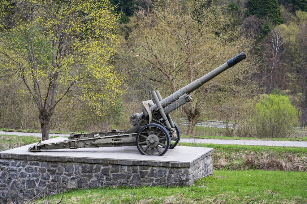 Cannon from the Second World War in Forest on Concrete Base Editorial ...
