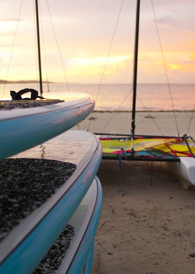 Canoe on Beach Early in the Morning Stock Photo - Image of chair, canoe ...