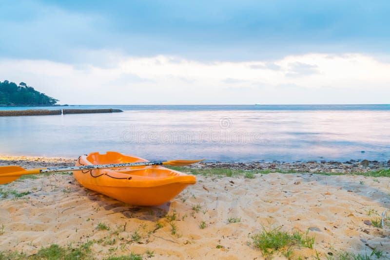 Canoe on beach stock photo. Image of cloud, weather, island - 90351534