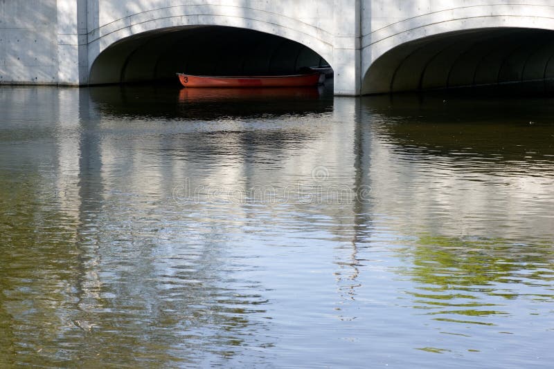 Canoe below the bridge stock image. Image of ripple, ontario - 9672789