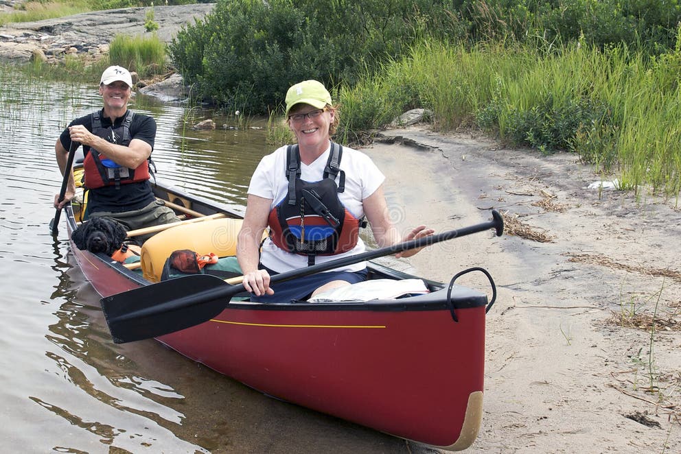 Canoe Camping stock photo. Image of jackets, baby, paddling - 29473192