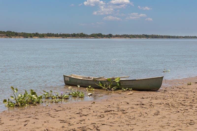 A Canoe Moored on the River Bank Editorial Image - Image of boat ...