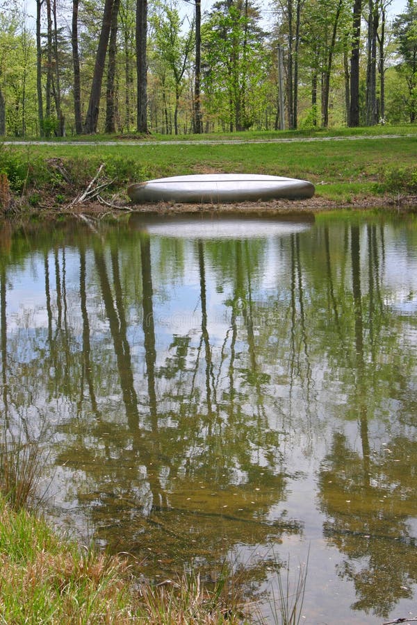 Canoe & Pond stock photo. Image of sport, paddle - 24252776