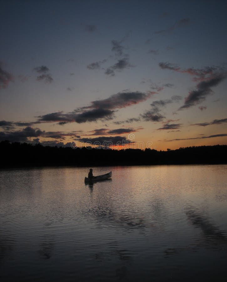 Canoe sunset at Arisaig stock photo. Image of sunlight - 14297630