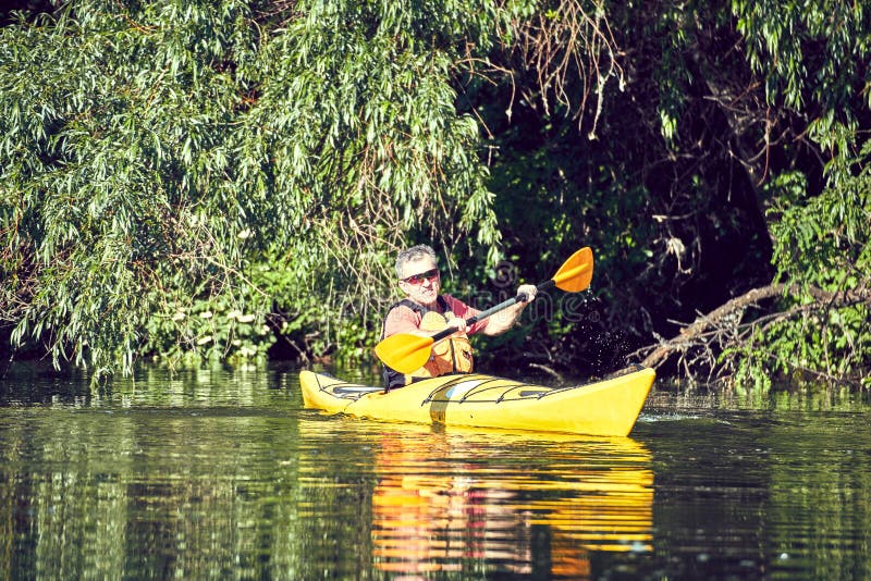 A Canoe Trip on the River in the Summer. Stock Photo - Image of paddle ...