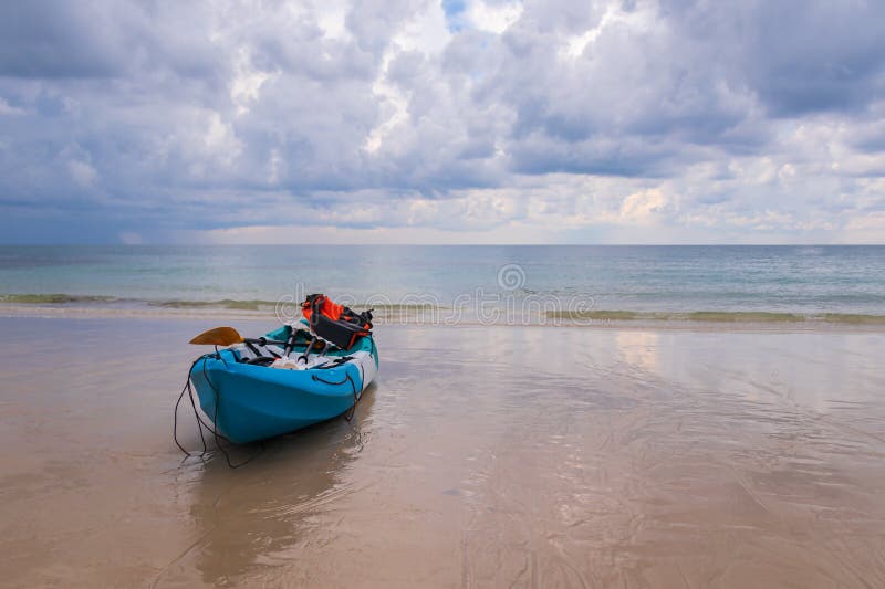 Canoe on the Tropical Beach Stock Photo - Image of scenery, stormy ...
