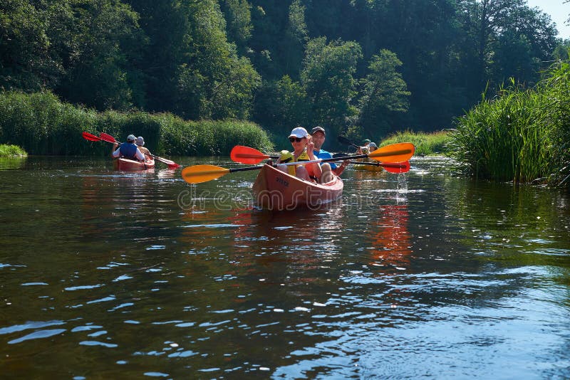 Canoeing by the River. Lithuania by the River Minija. Editorial ...