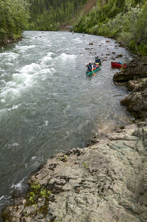 Canoeing River Rapids in Wild, Remote Alaska Editorial Stock Photo ...