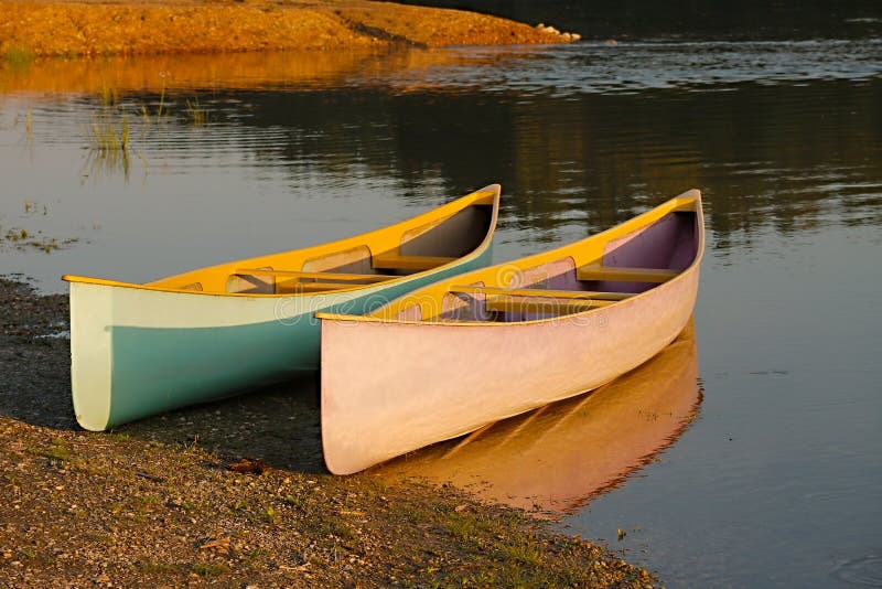 Canoes on the Riverside stock photo. Image of ashore - 72512476