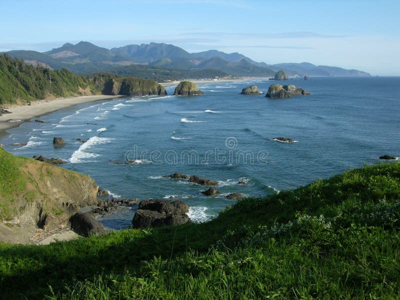 Canon Beach stock image. Image of blue, cannon, outcropping - 29012411