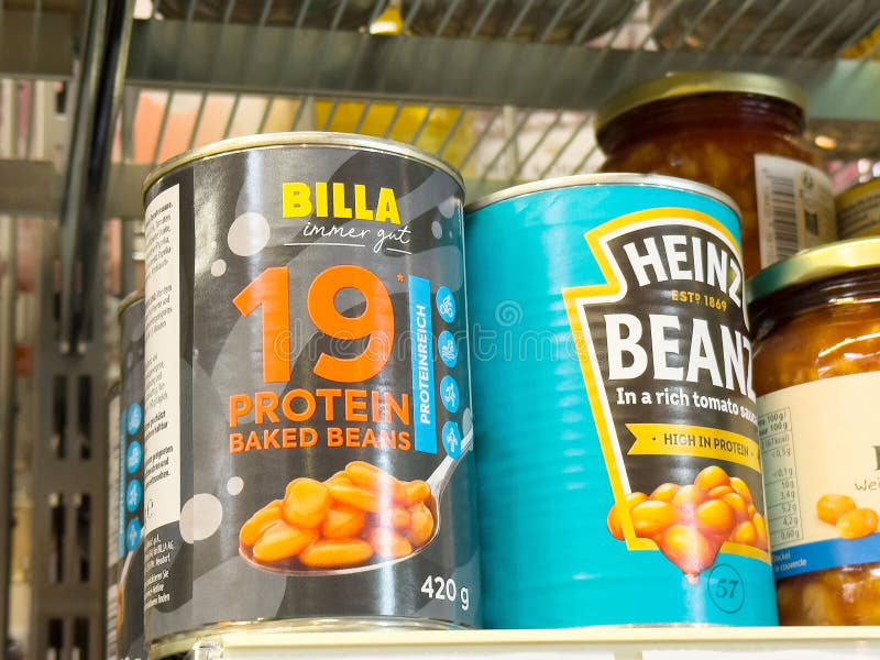 Cans of Baked Beans on Grocery Shelf Displaying Protein Content ...