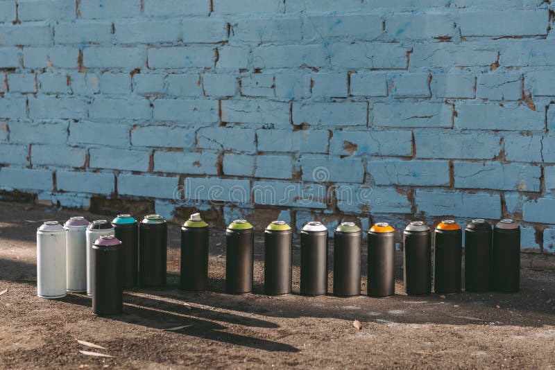 Cans with Colorful Spray Paint Standing in Row Stock Image - Image of ...