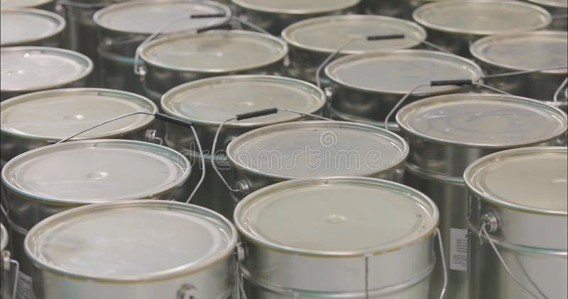 Cans with Material on a Construction Site. a Lot of Metal Cans at a ...