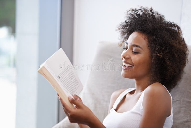 She Cant Put this Book Down. a Beautiful Woman Reading a Book. Stock ...