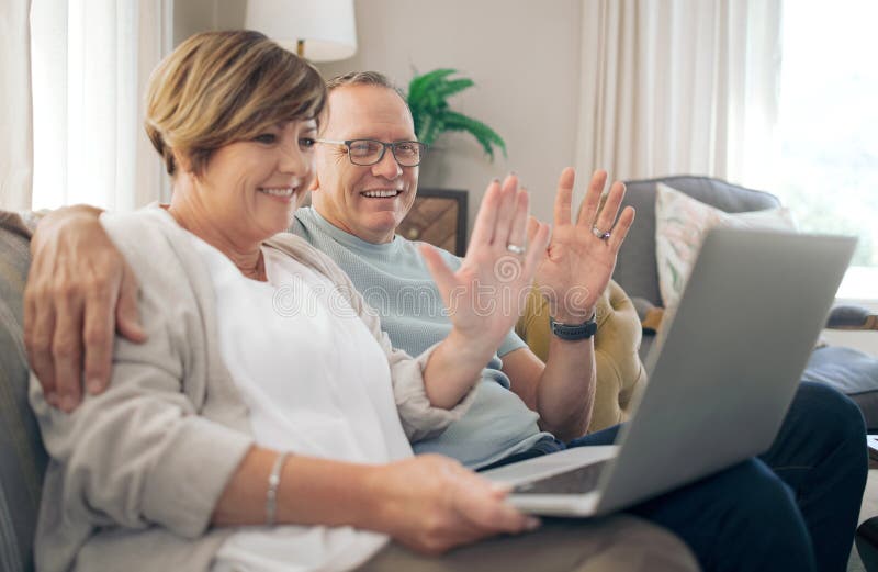 We Cant Wait To See You Again A Mature Couple Using Their Laptop To