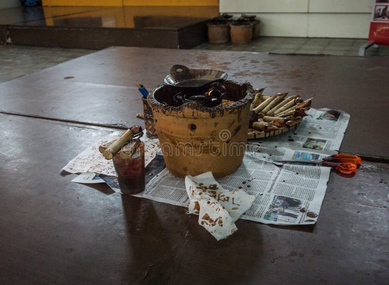 Canting and Hot Wax on Top of Wood Table for Batik Processing Photo ...