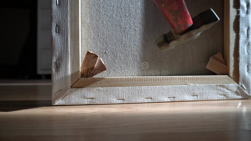 Canvas Stretching with a Hammer and Wedges Stock Footage - Video of ...