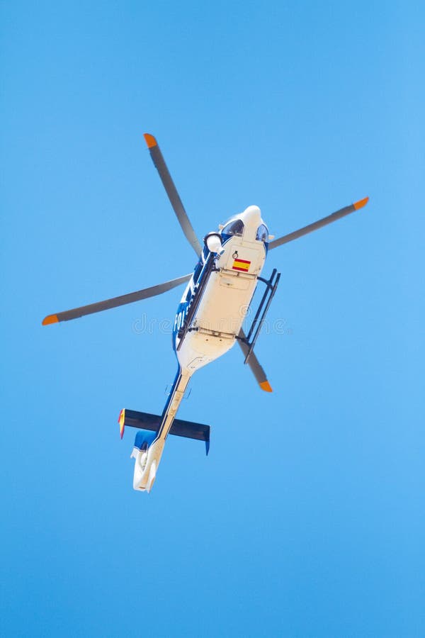 Canvasing the Area. Low Angle Shot of a Police Helicopter in the Sky ...