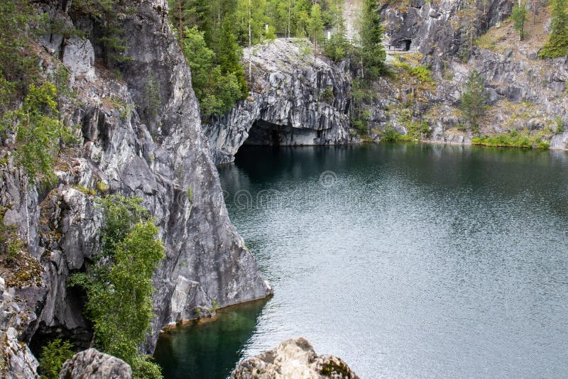 Canyon Lake with Tall Marble Cliffs Overgrown with Trees and Shrubs ...