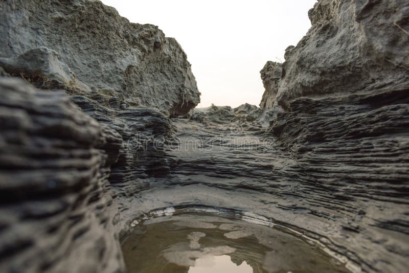 Canyon Path in a Sunny Day in between High Rocks with a Tiny Lake Stock ...