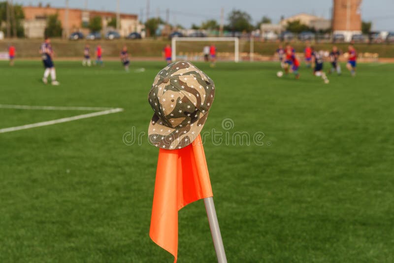 Cap on the football field stock photo. Image of action - 178712106