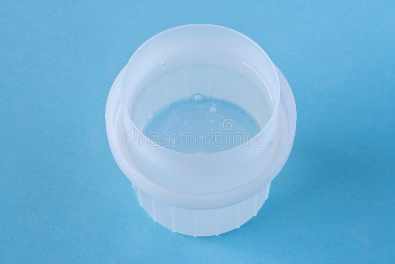 A Cap Full of Eco Friendly Laundry Detergent Stock Image - Image of ...