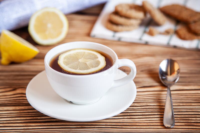 Cap of Tea with Lemon and Cookies on the Wooden Table Stock Photo ...