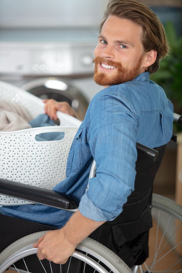 Capable Disabled Man Doing Laundry Stock Image - Image of cloth, equal ...