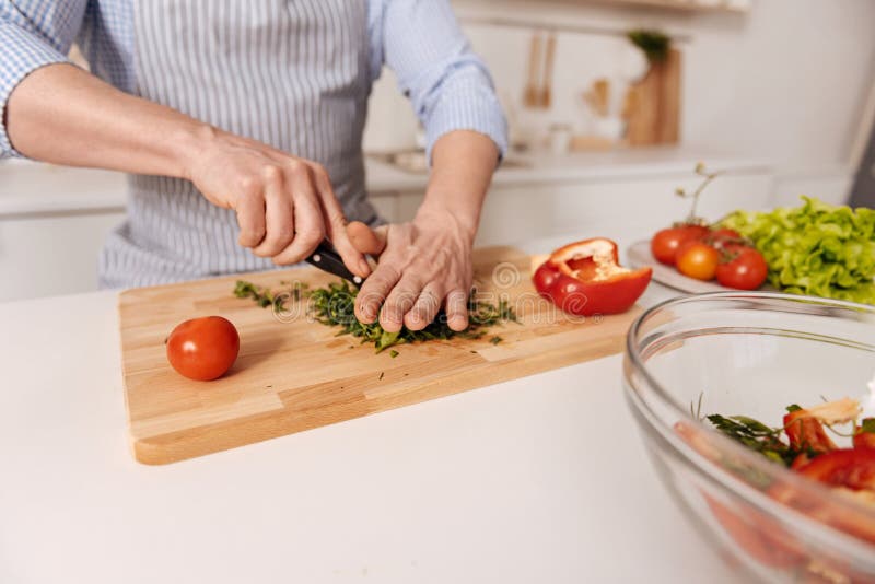 Capable Man Preparing Vegetarian Dish in the Kitchen Stock Image ...