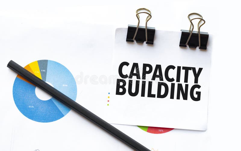 Capacity Building on Notebook with Charts and Pencil Stock Image ...