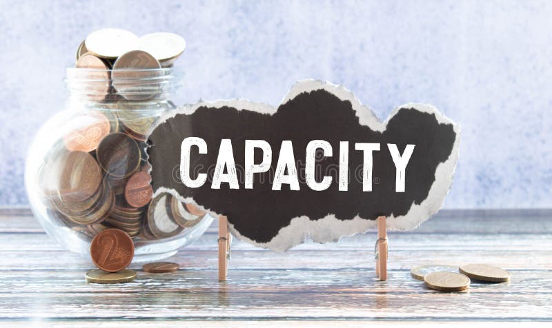 CAPACITY is Written on a Card Attached To the Corkboard with a Button ...