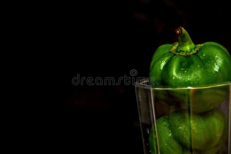 Capcicum in glass stock image. Image of glass, product - 190258071
