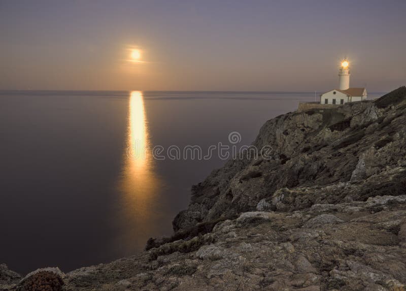 Capdepera Lighthouse at Dusk, with Moonbeam on Sea and Rocks, Mallorca ...