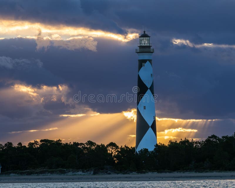 Cape Lookout Lighthouse at Sunset with Dramatic Clouds. Stock Image ...