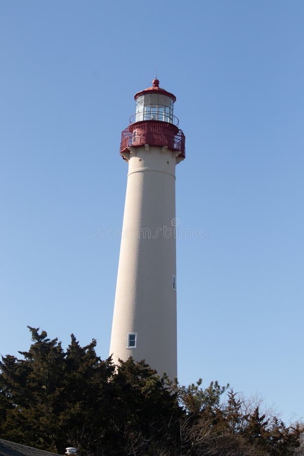 Cape May Point Lighthouse Stretching Out into a Clear Blue Sky. White ...