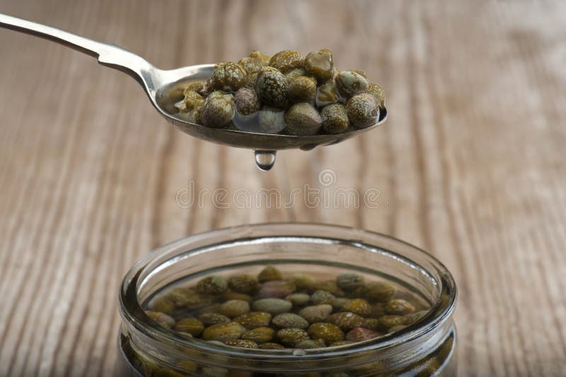 Capers on Spoon stock image. Image of pickled, flavoring - 14499345