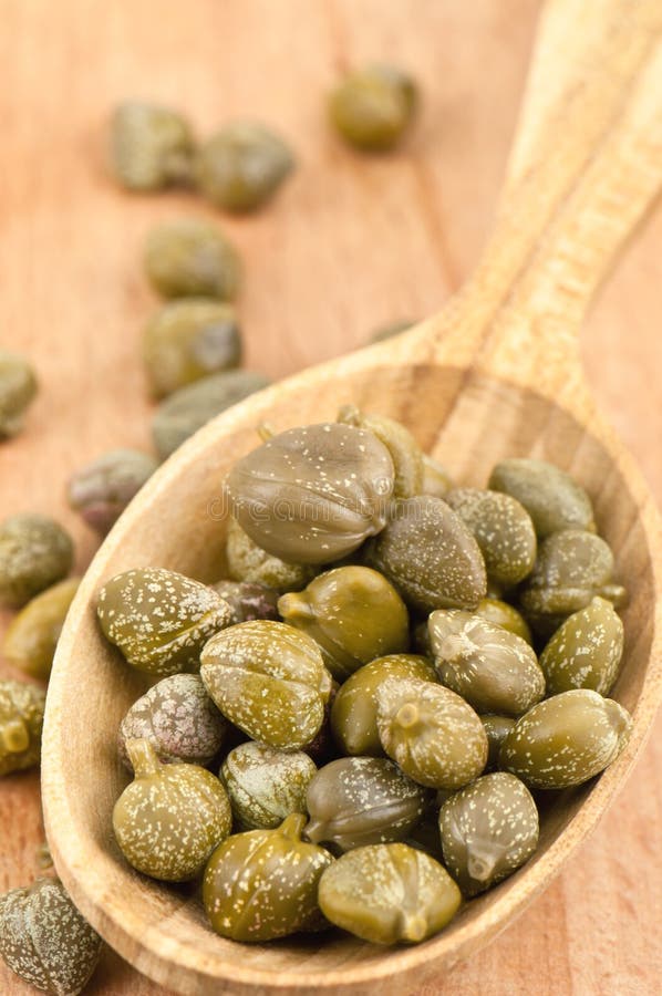 Capers in spoon stock photo. Image of salad, italian - 30615258
